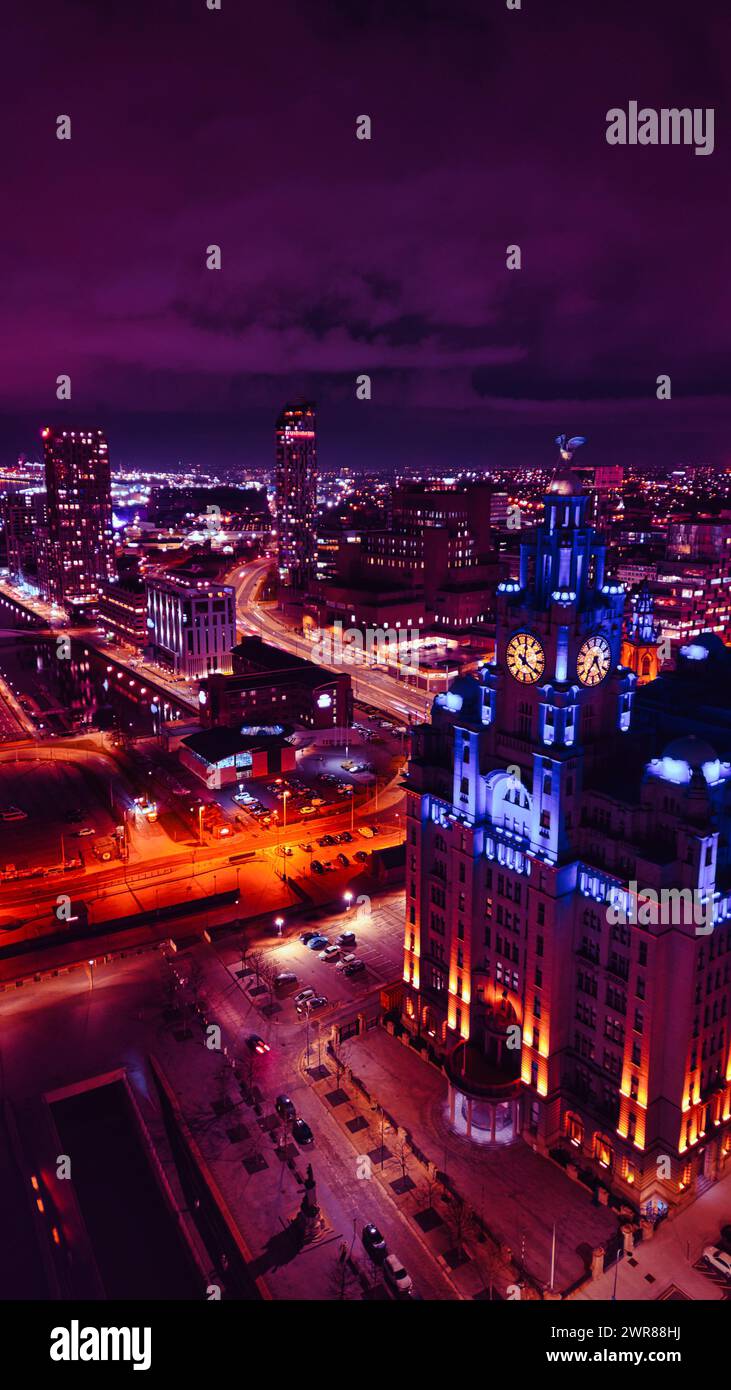 Aerial night view of a vibrant cityscape with illuminated streets and ...