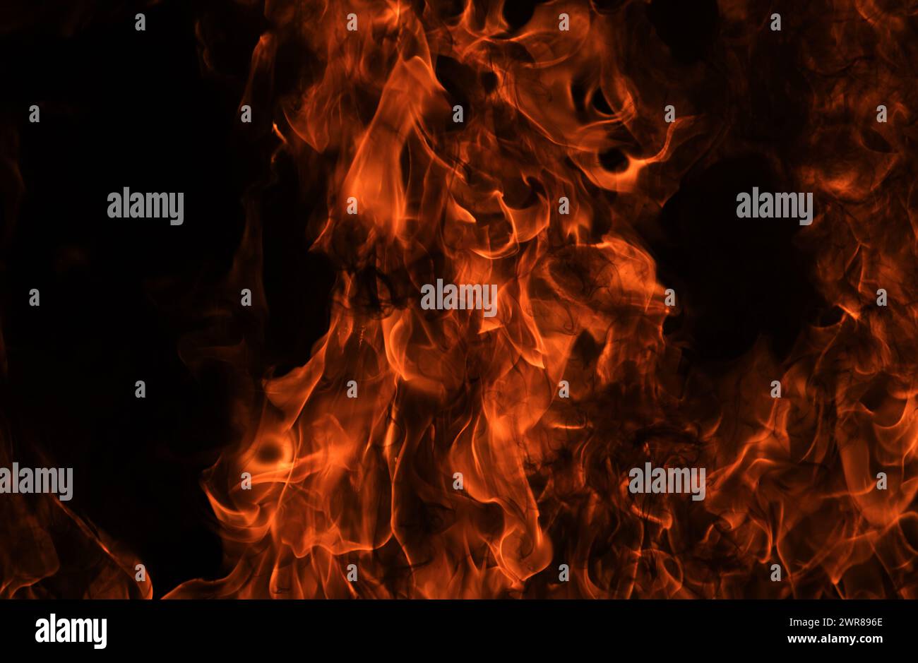 Texture of fire on a black background. Abstract fire flame background ...