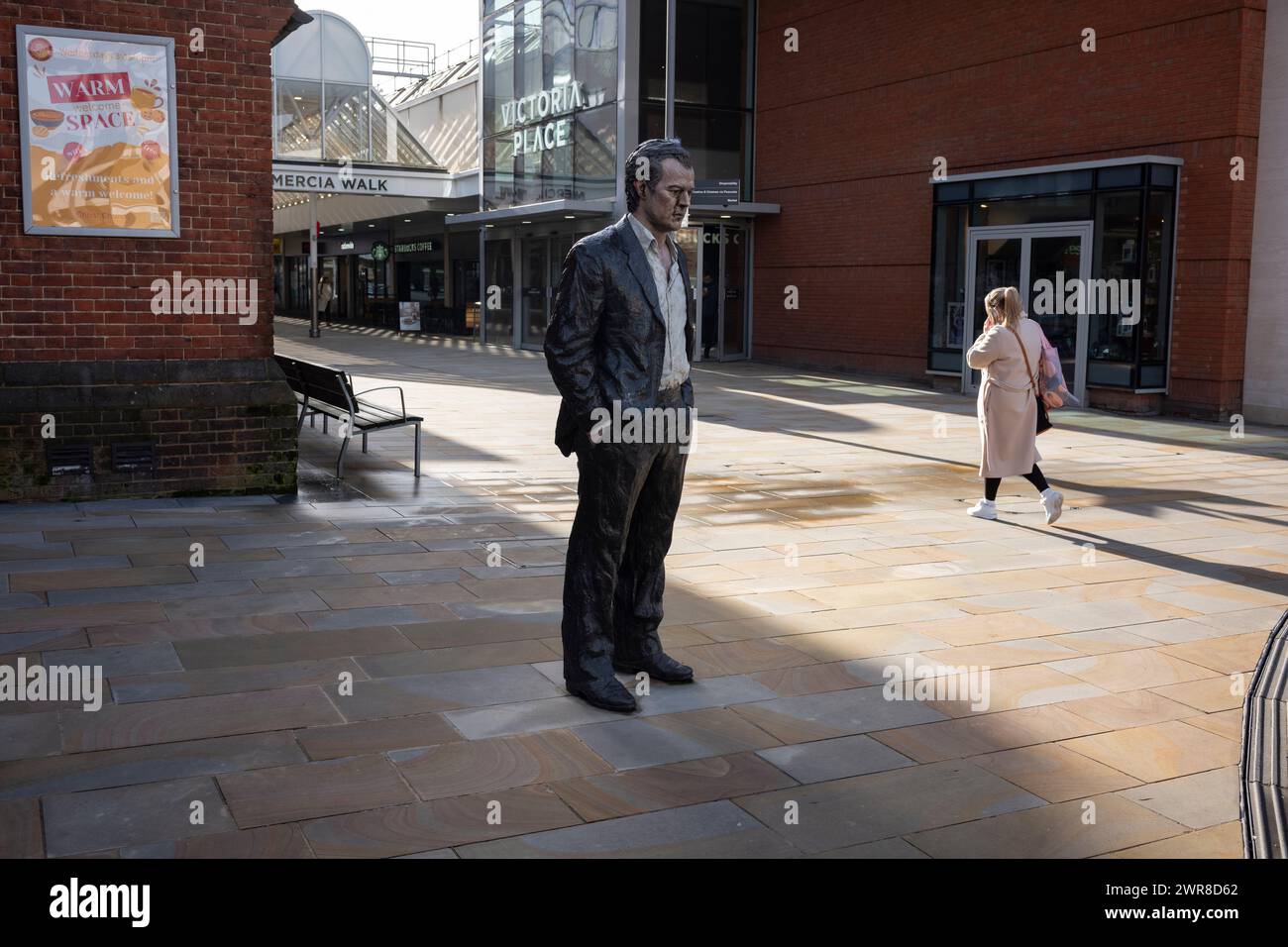 'Standing man' sculpture in Woking town centre, in Surrey, England ...