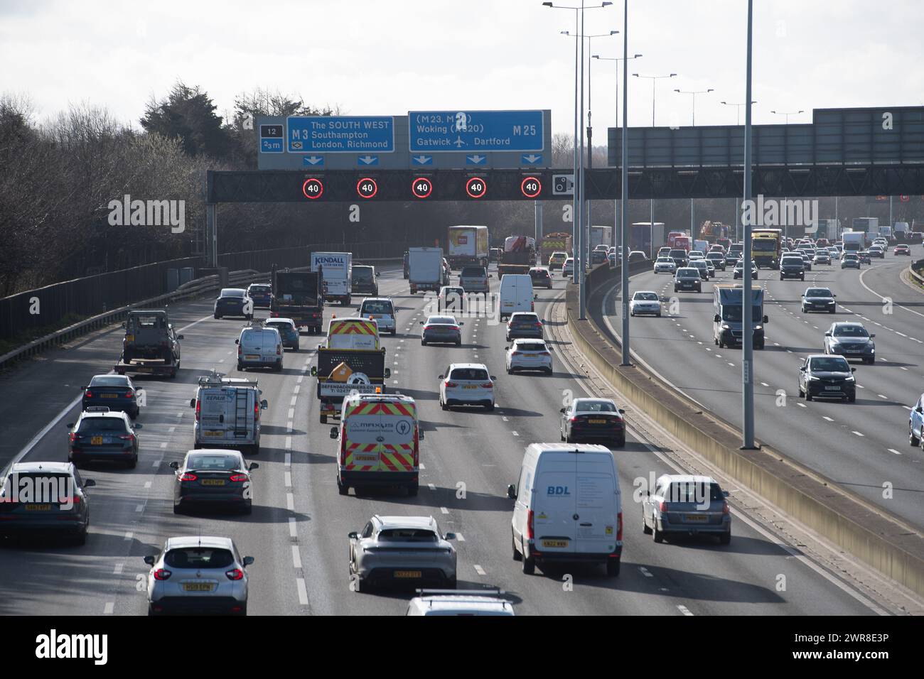 Egham, Surrey, UK. 4th March, 2024. Busy traffic on the M25 Motorway at ...