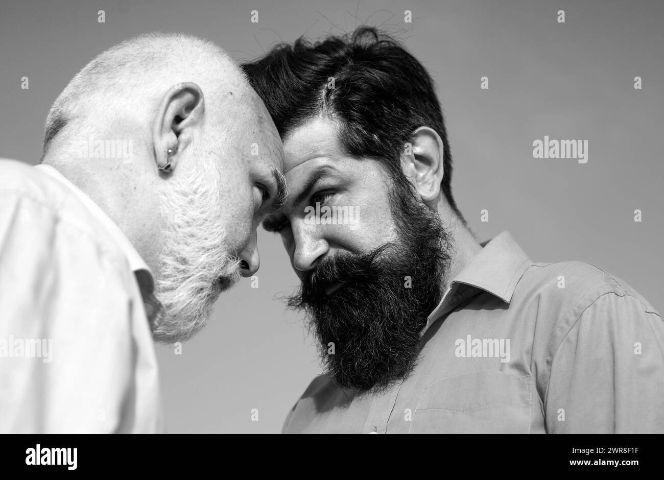 Men generations: grandfather and father together. Elderly Senior man ...