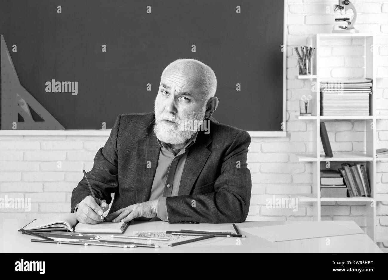 A teacher who works professionally. A teacher who knows a lot. Teacher ...