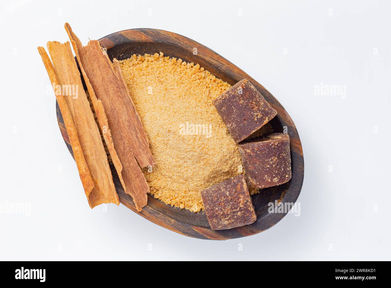 Piloncillo en bar and ground piloncillo, a product of sugar cane Stock ...