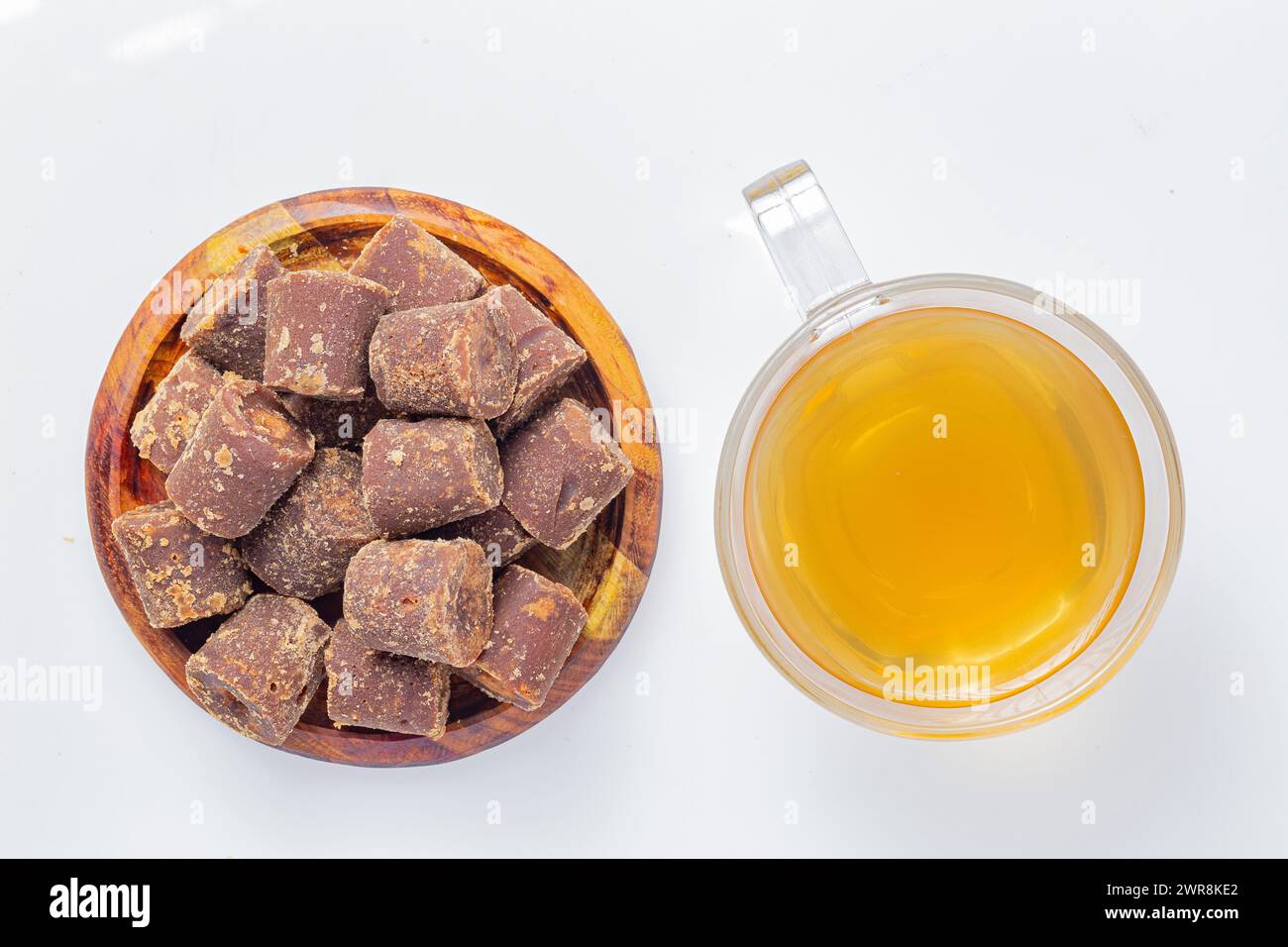 Piloncillo, ground piloncillo and piloncillo tea isolated on white ...