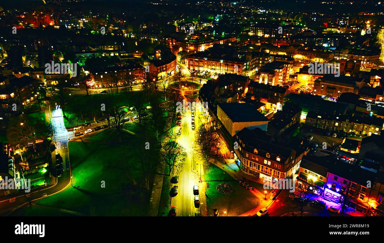 Aerial night view of a vibrant cityscape with illuminated streets and ...