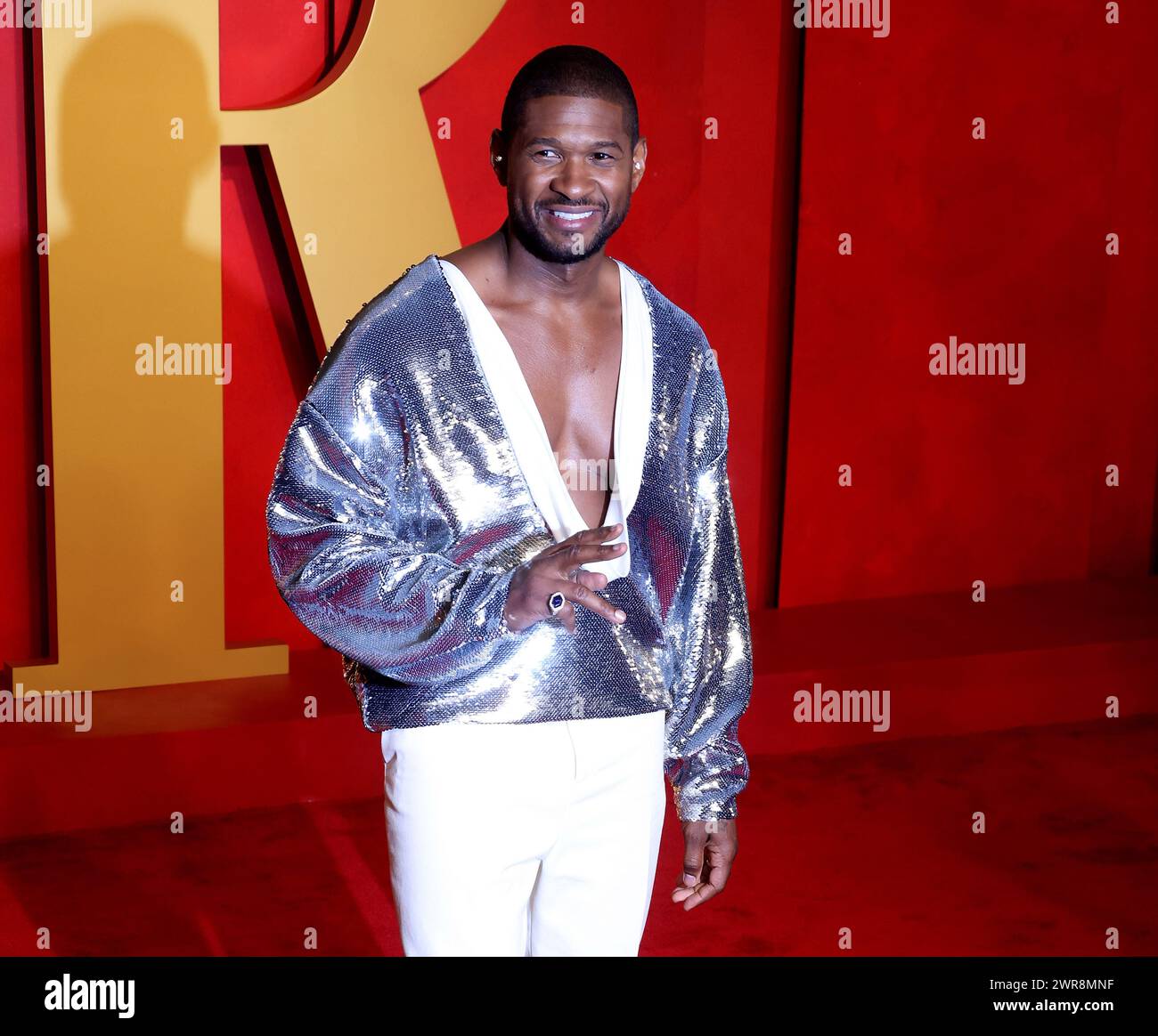 Usher attends the 2024 Vanity Fair Oscar Party Hosted By Radhika Jones ...