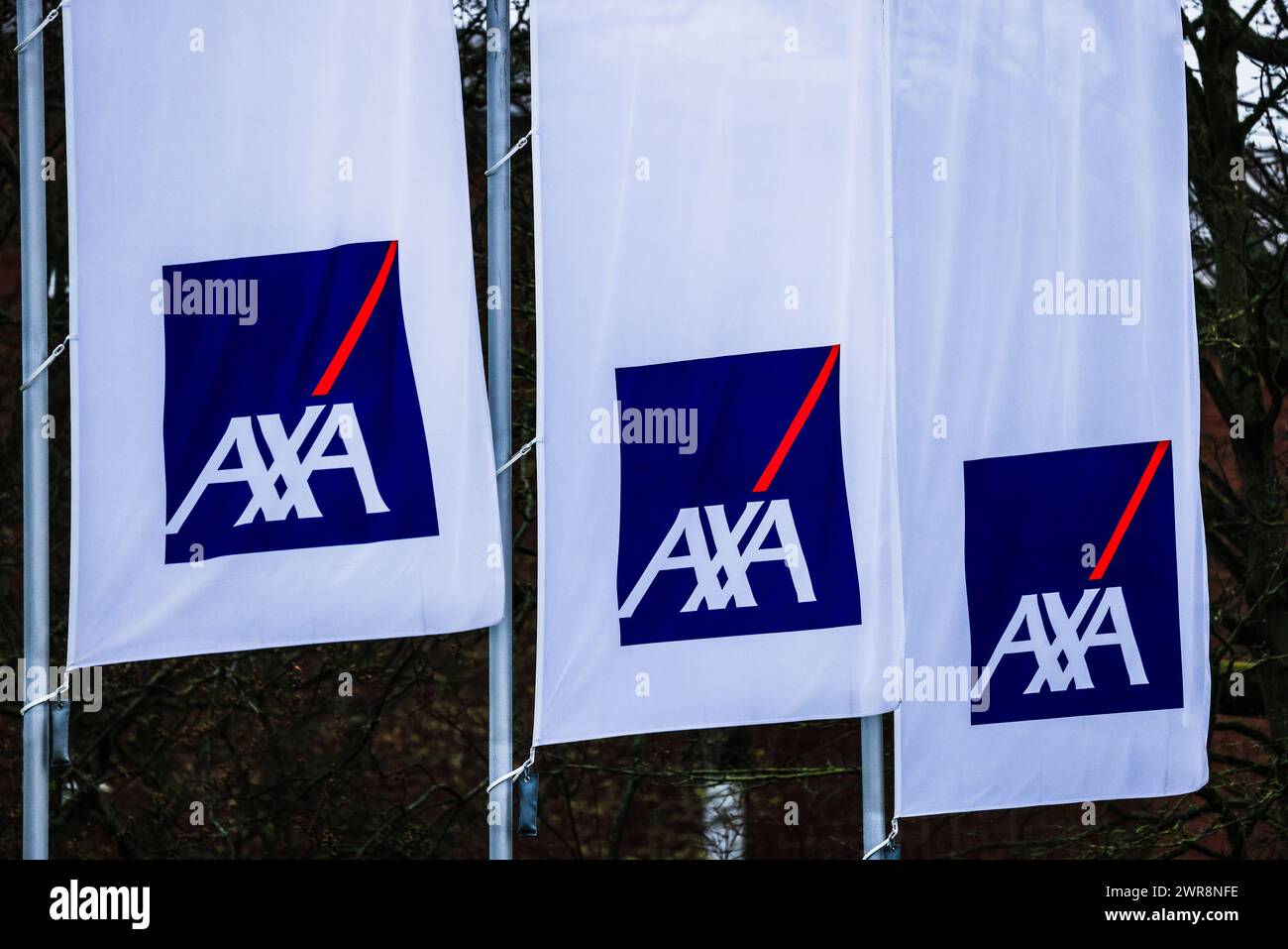 Cologne, Germany. 11th Mar, 2024. Flags fly in front of the Axa ...