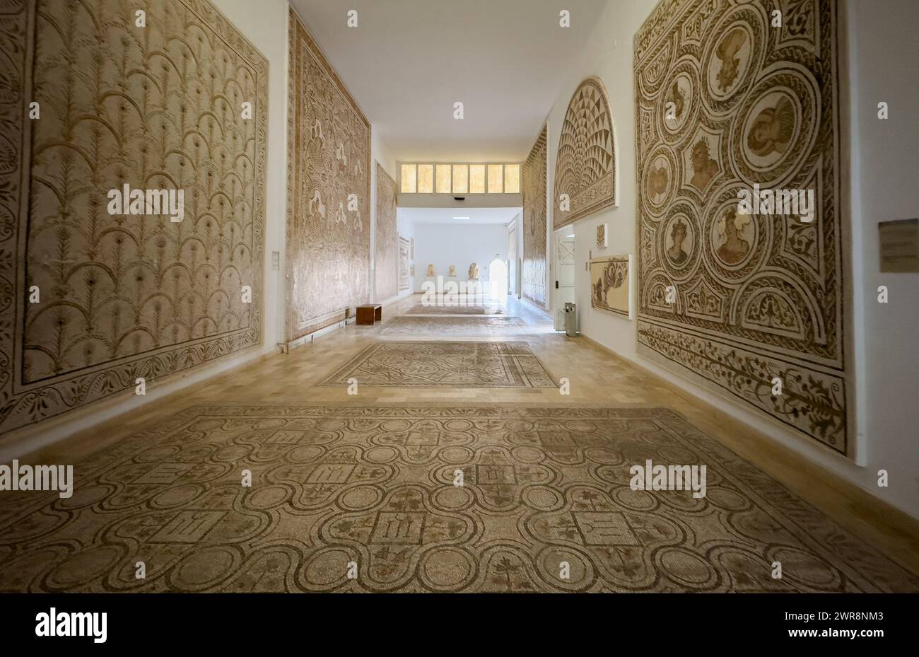 Roman mosaics on display inside the El Jem Archaeological Museum ...