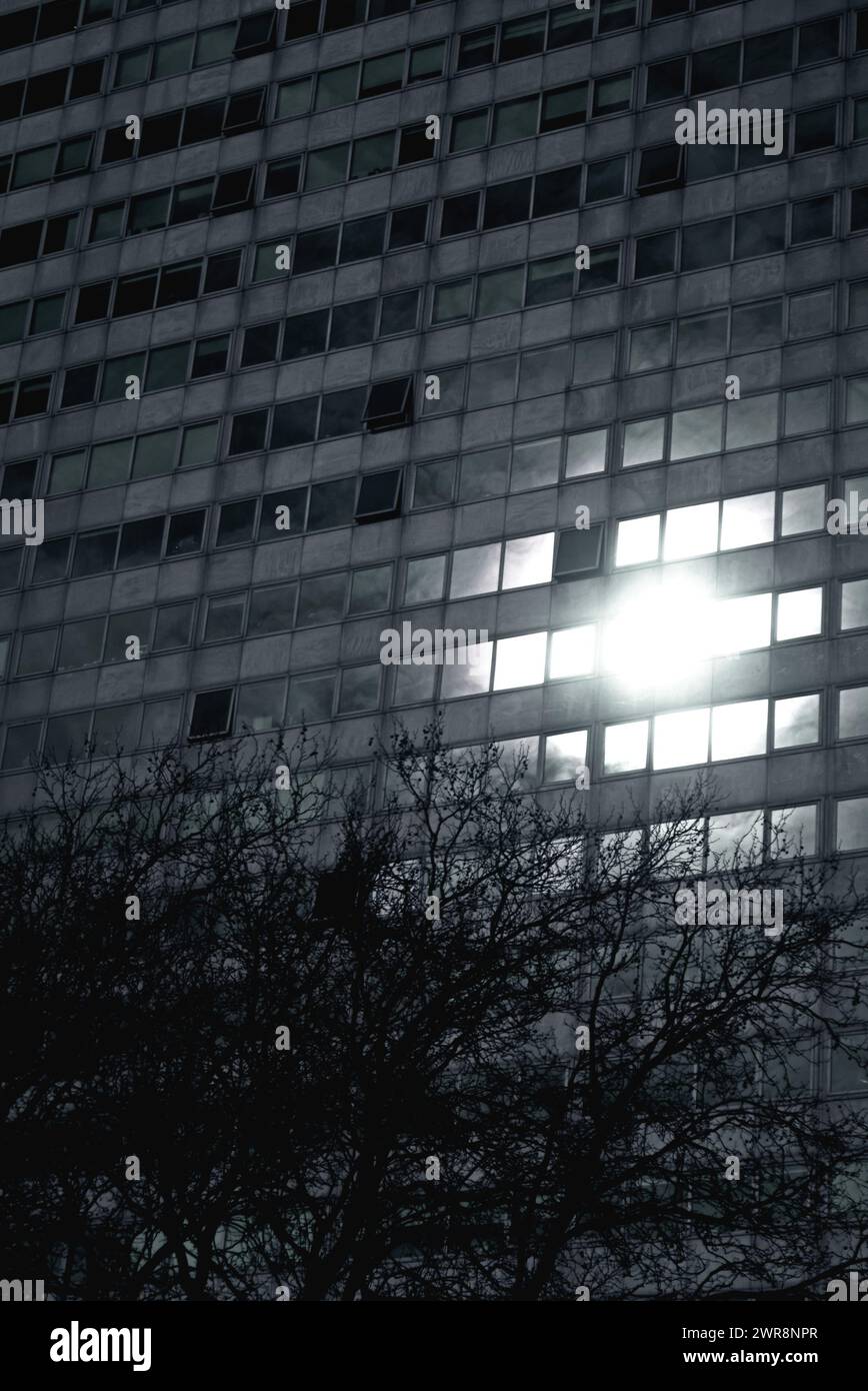 Editorial image of police helicopter searchlight reflecting off an ...