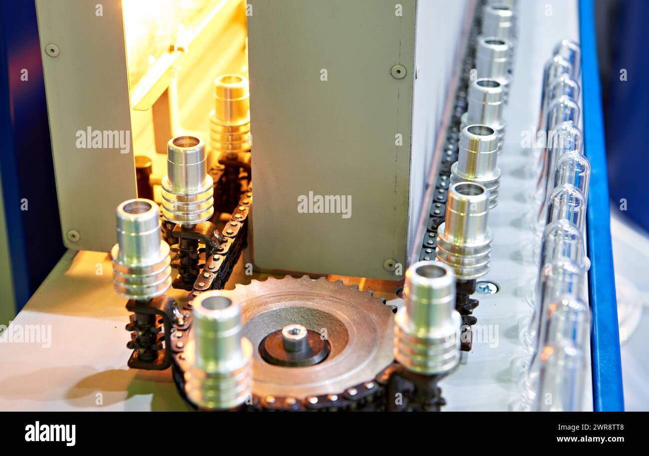 Semi-automatic blowing machine for bottles production Stock Photo - Alamy
