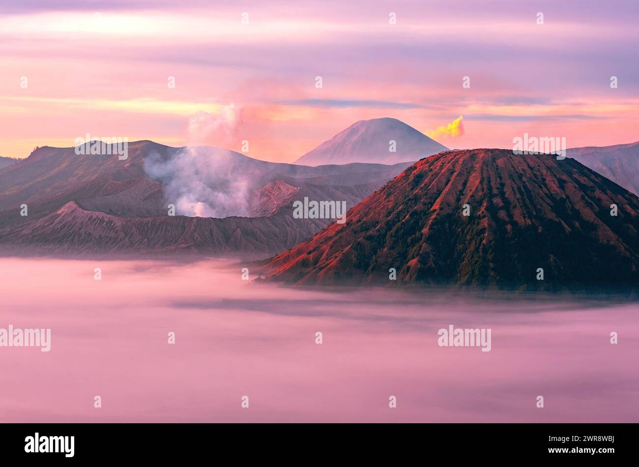 Magical view of the erupting Bromo volcano at sunrise. Java Island ...