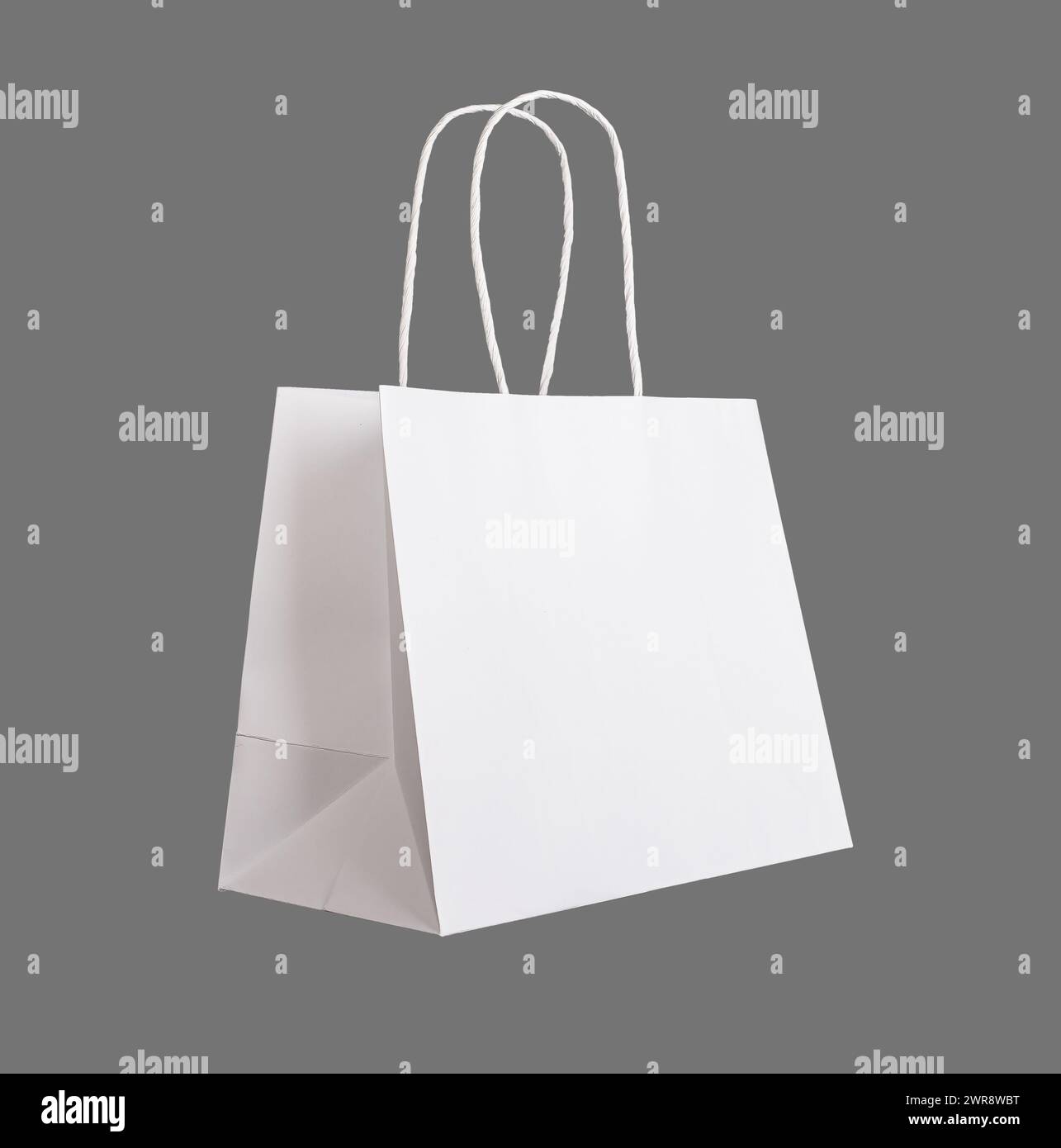White paper bag, shopping parcel, packet with handles isolated Stock ...