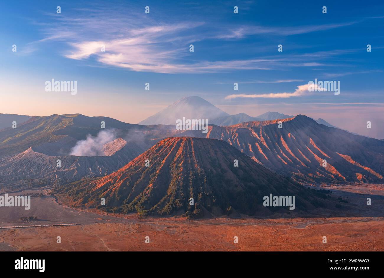 Magical view of the erupting Bromo volcano at sunrise. Java Island ...