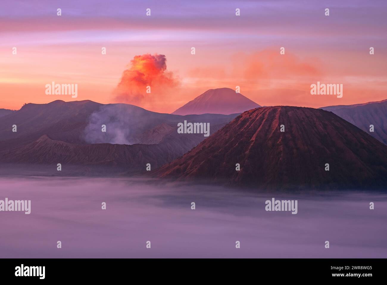 Magical view of the erupting Bromo volcano at sunrise. Java Island ...