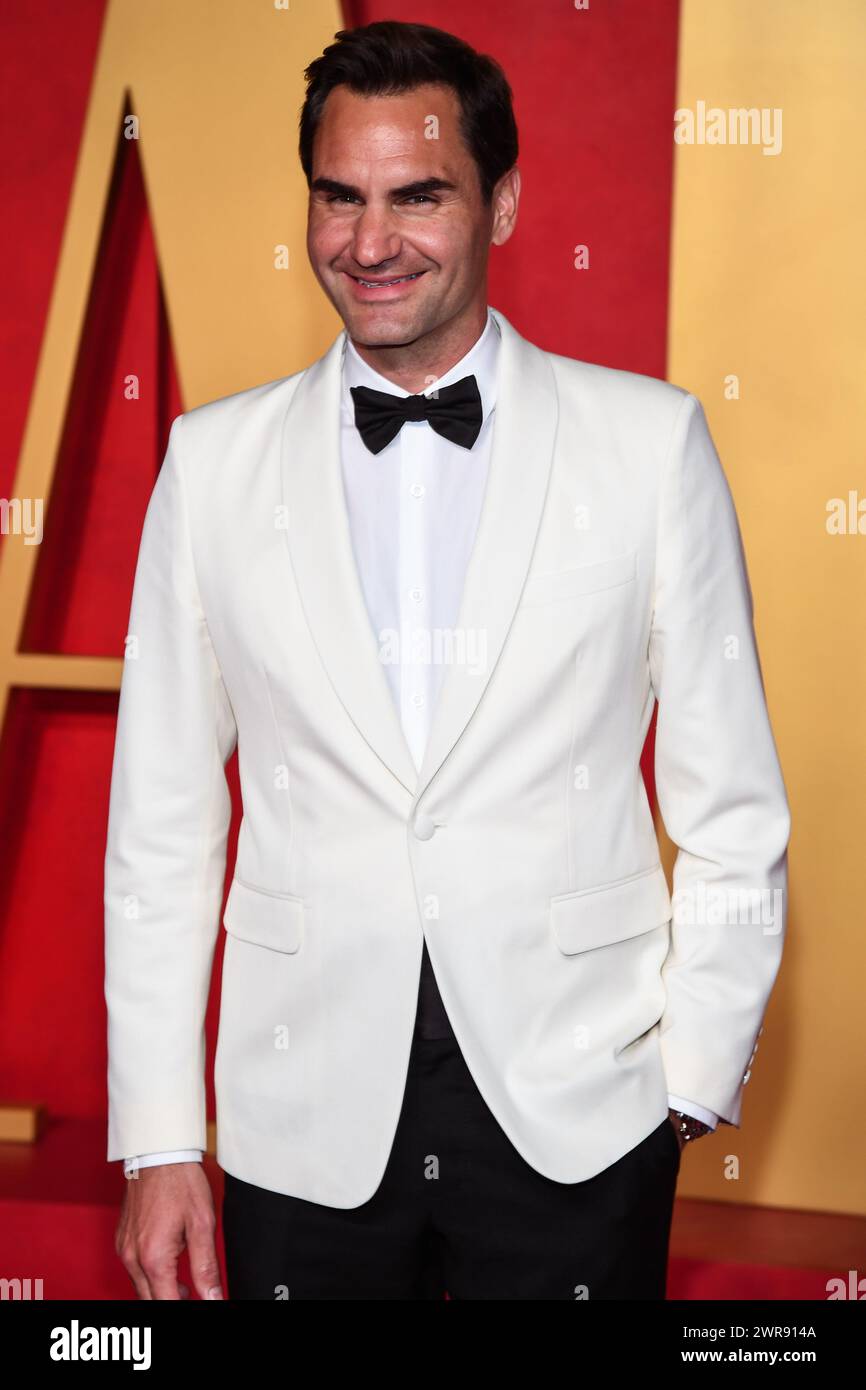 USA. 10th Mar, 2024. Roger Federer walking on the red carpet at the ...
