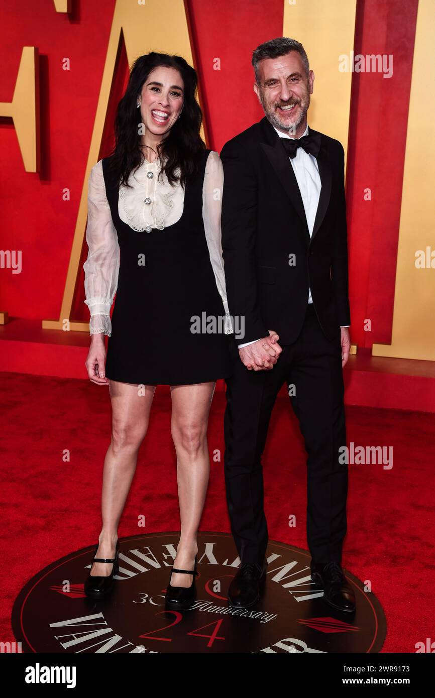 USA. 10th Mar, 2024. Sarah Silverman and Rory Albanese walking on the ...