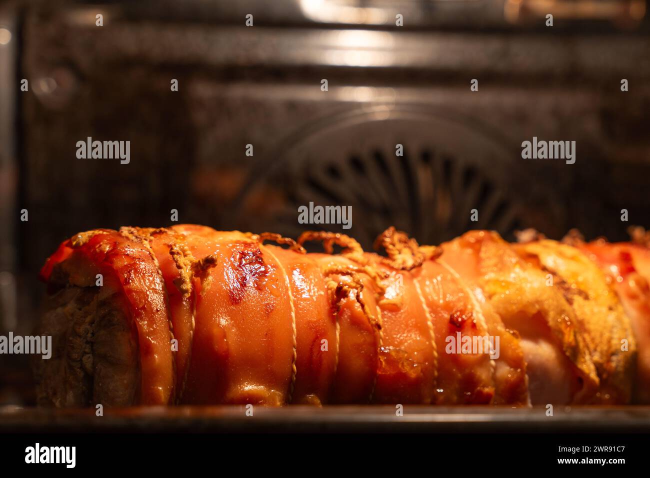Baked pork wrapped in a roll. Pork roll close-up Stock Photo - Alamy
