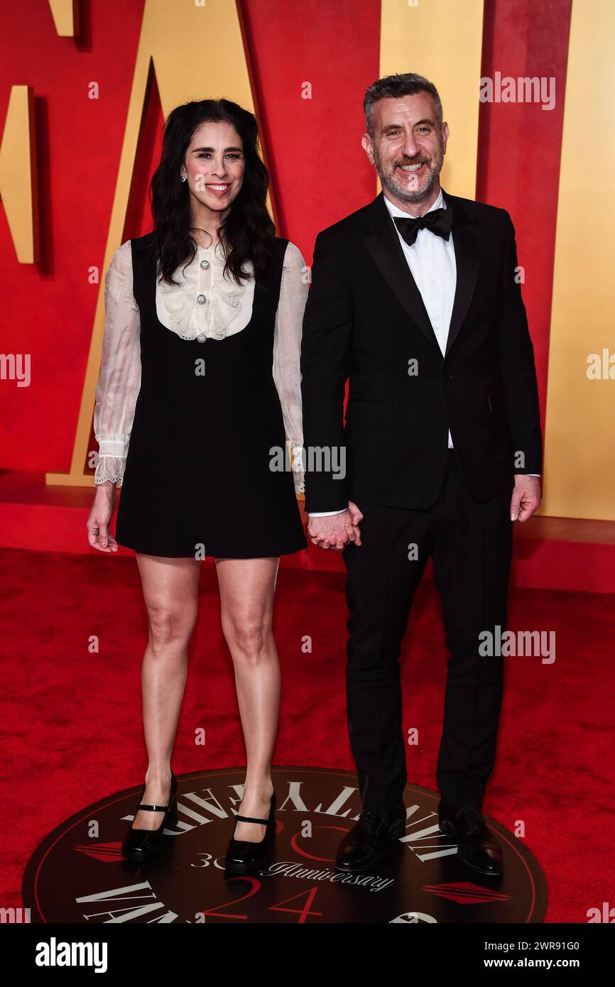 USA. 10th Mar, 2024. Sarah Silverman and Rory Albanese walking on the ...