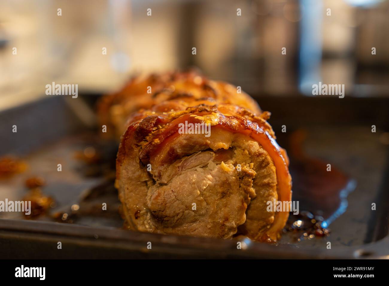 Baked pork wrapped in a roll. Pork roll close-up Stock Photo - Alamy