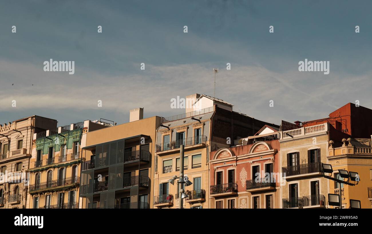 Colorful Barcelona buildings by the sidewalk Stock Photo - Alamy