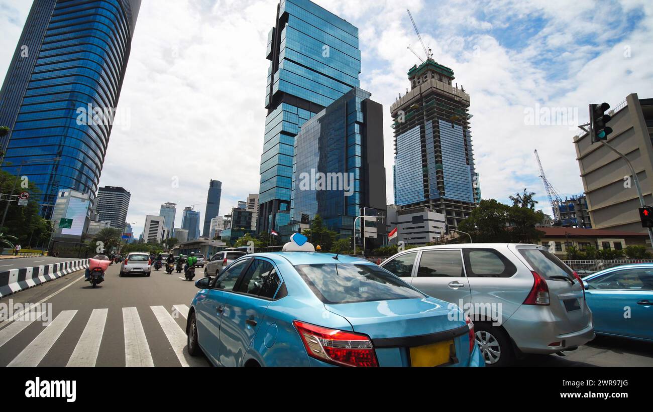 Jakarta's roads and streets with cars during the daytime Stock Photo ...