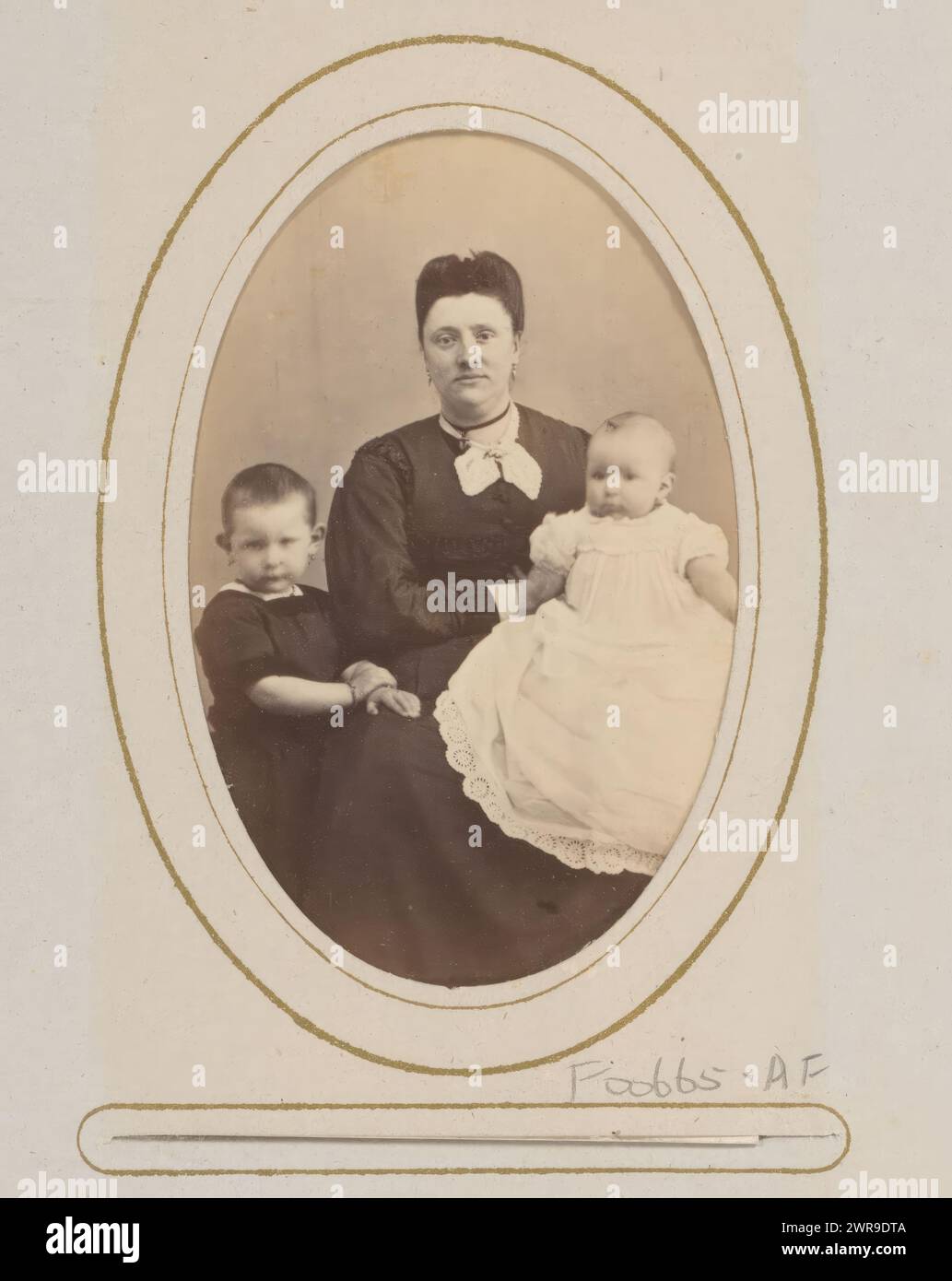 Portrait of a woman with two small children, This photo is part of an album., Hermanus Siderius ...