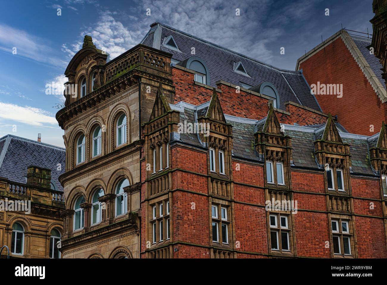 Victorian architecture with ornate details and blue sky in Leeds, UK ...