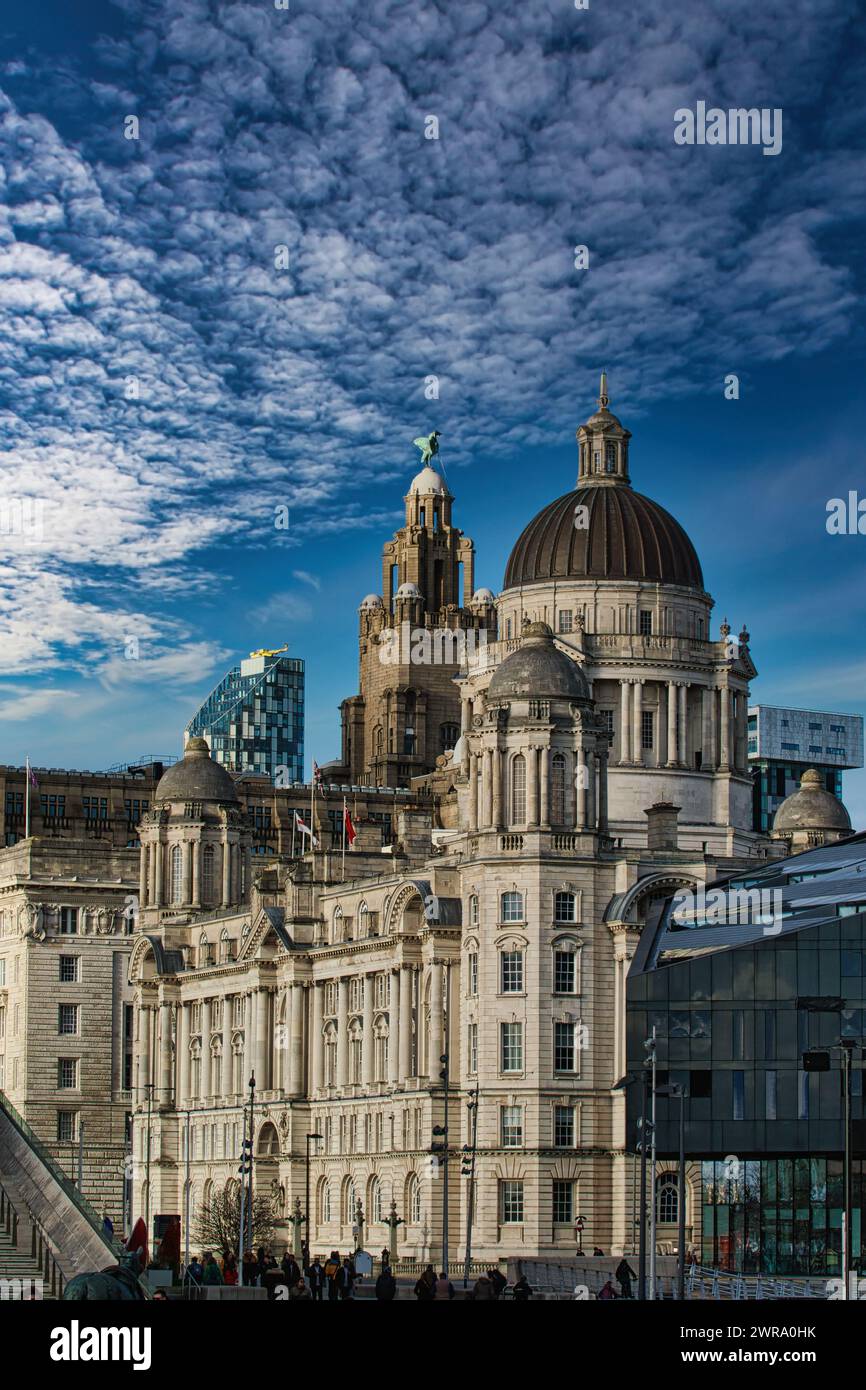 Dramatic sky over historic city buildings with intricate architecture ...