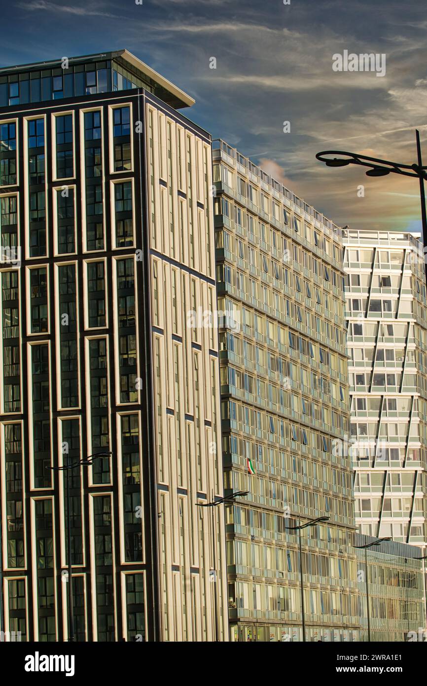 Modern urban architecture with reflective glass facade and contrasting ...