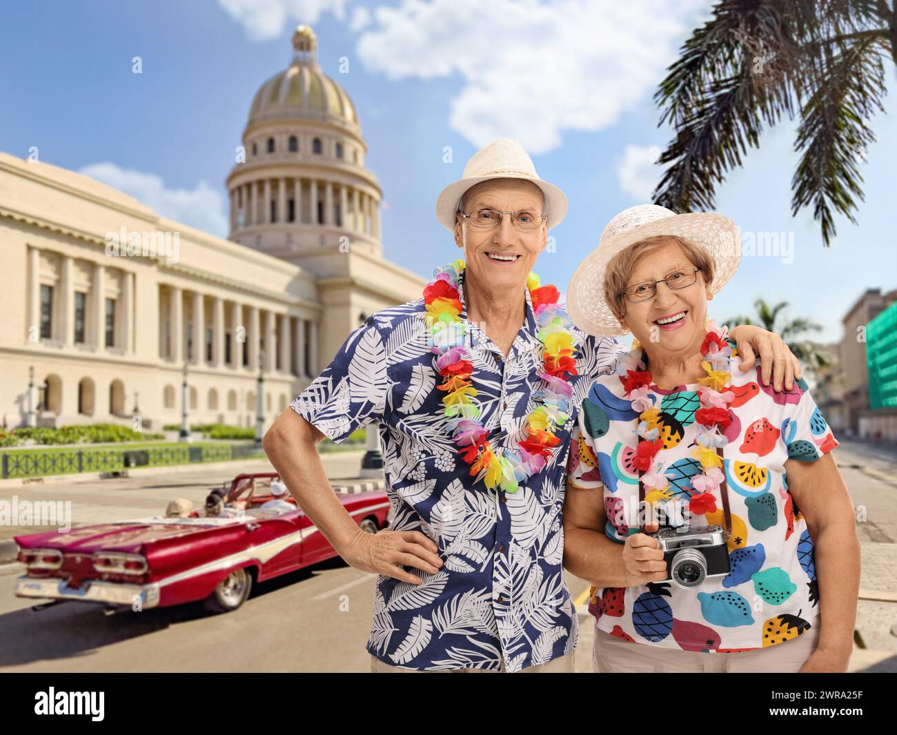 Happy mature couple tourists posing together in Havana, Cuba Stock ...