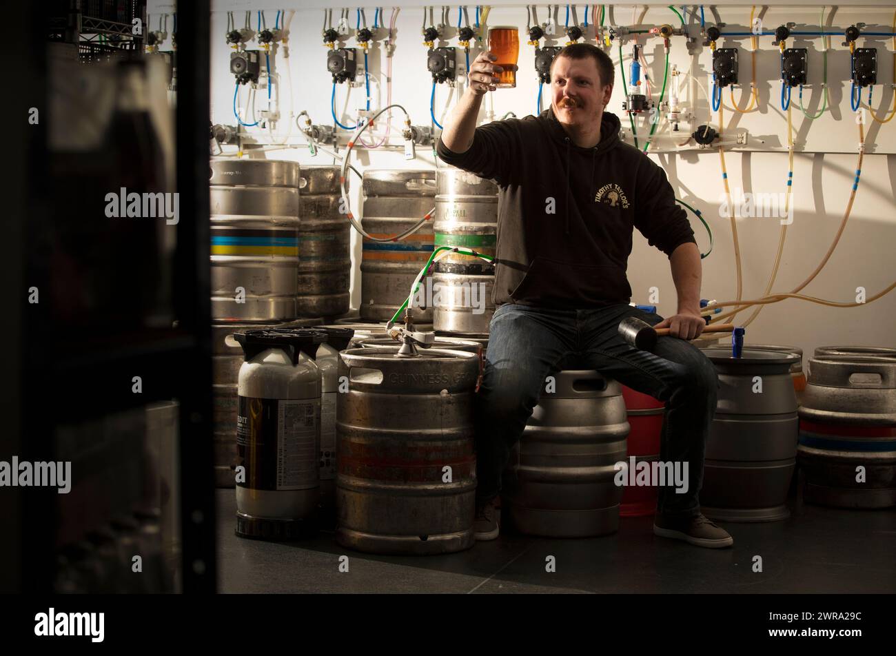 03/07/20 Cellar Manager, Chris Murch, 31, gets his beer ready for ...