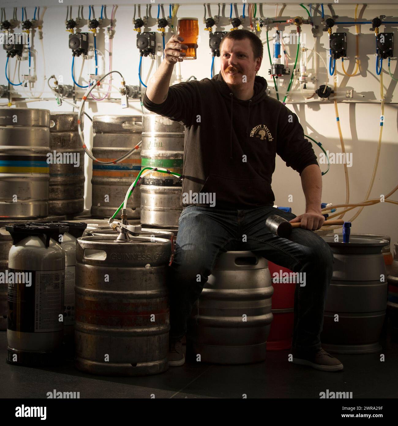03/07/20 Cellar Manager, Chris Murch, 31, gets his beer ready for ...