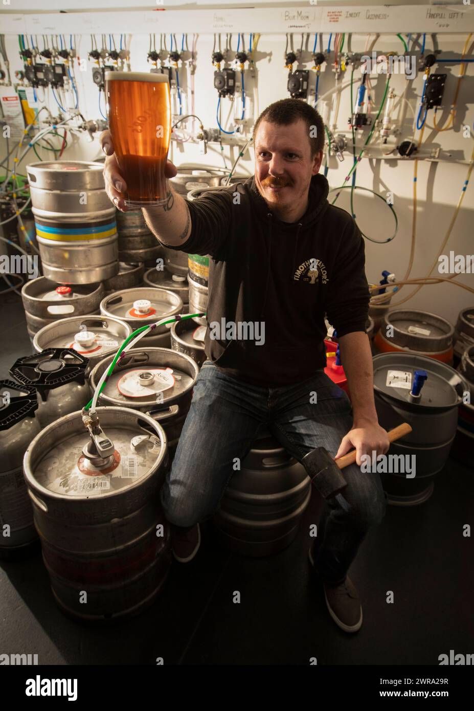 03/07/20 Cellar Manager, Chris Murch, 31, gets his beer ready for ...
