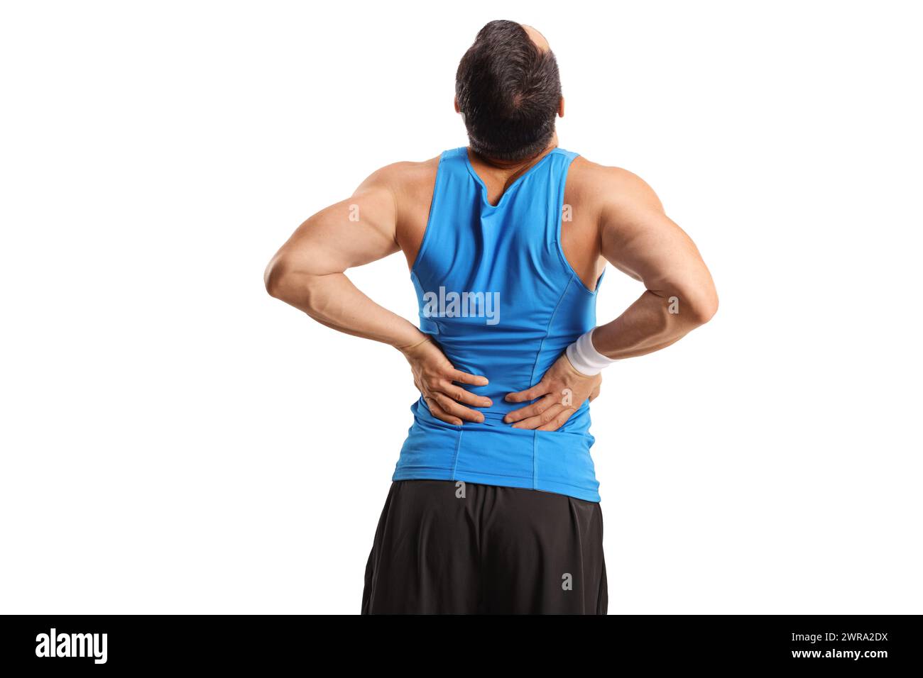 Rear view shot of a male athlete stretching his painful back isolated ...