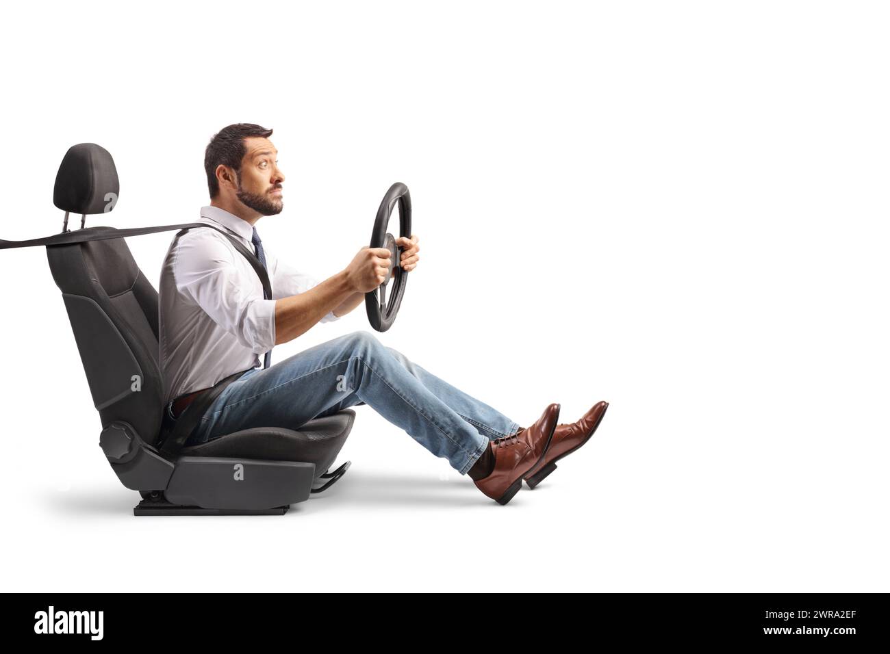 Scared driver holding a steering wheel isolated on white background ...