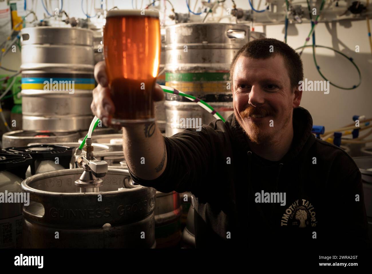 03/07/20 Cellar Manager, Chris Murch, 31, gets his beer ready for ...