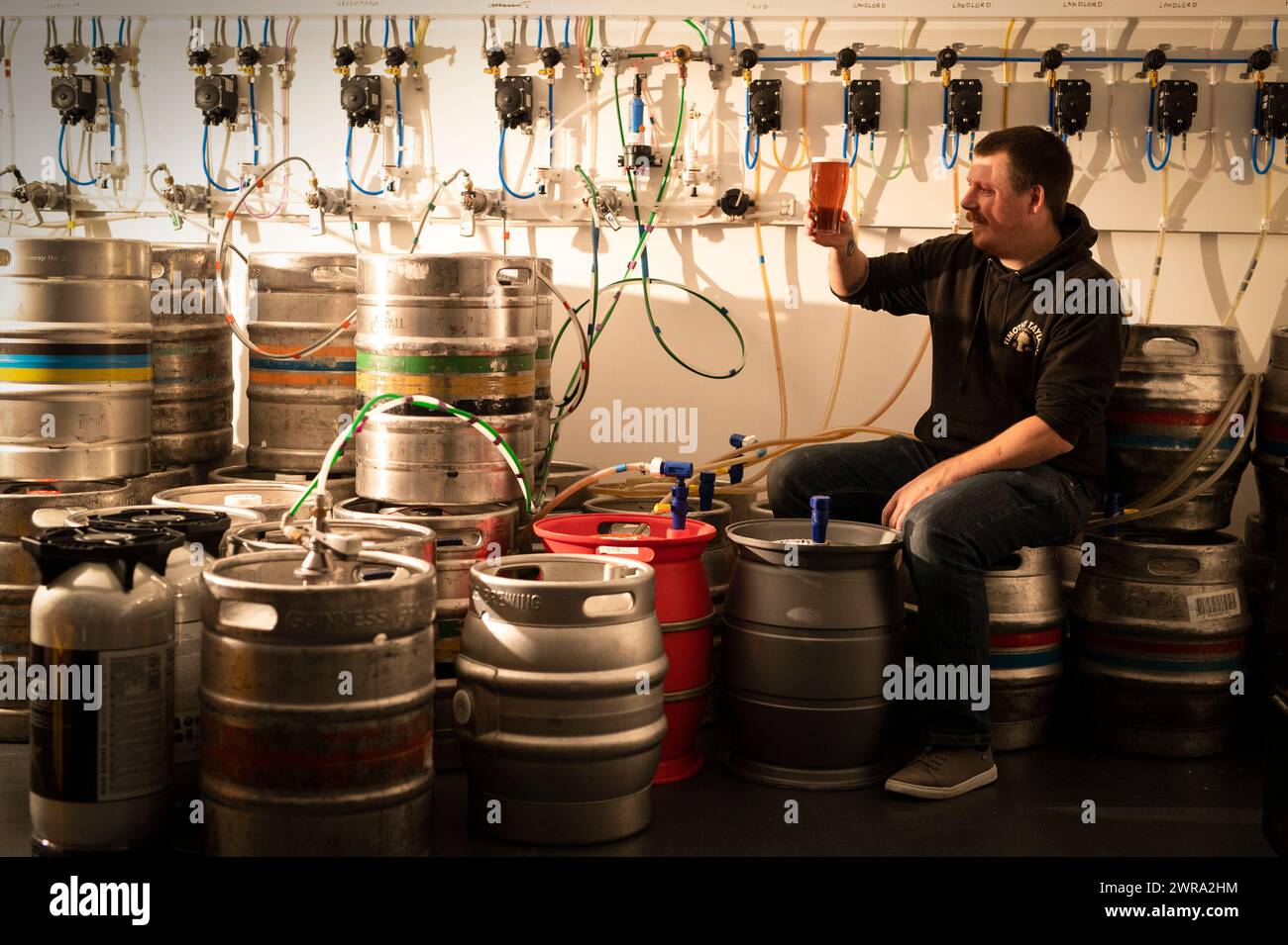 03/07/20 Cellar Manager, Chris Murch, 31, gets his beer ready for ...