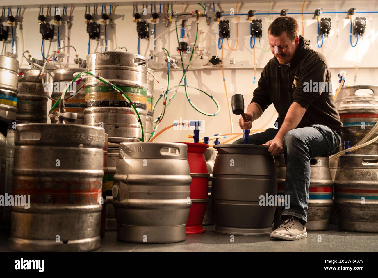 03/07/20 Cellar Manager, Chris Murch, 31, gets his beer ready for ...