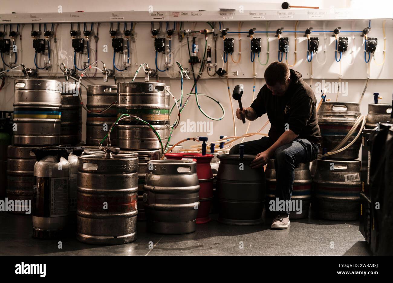 03/07/20 Cellar Manager, Chris Murch, 31, gets his beer ready for ...