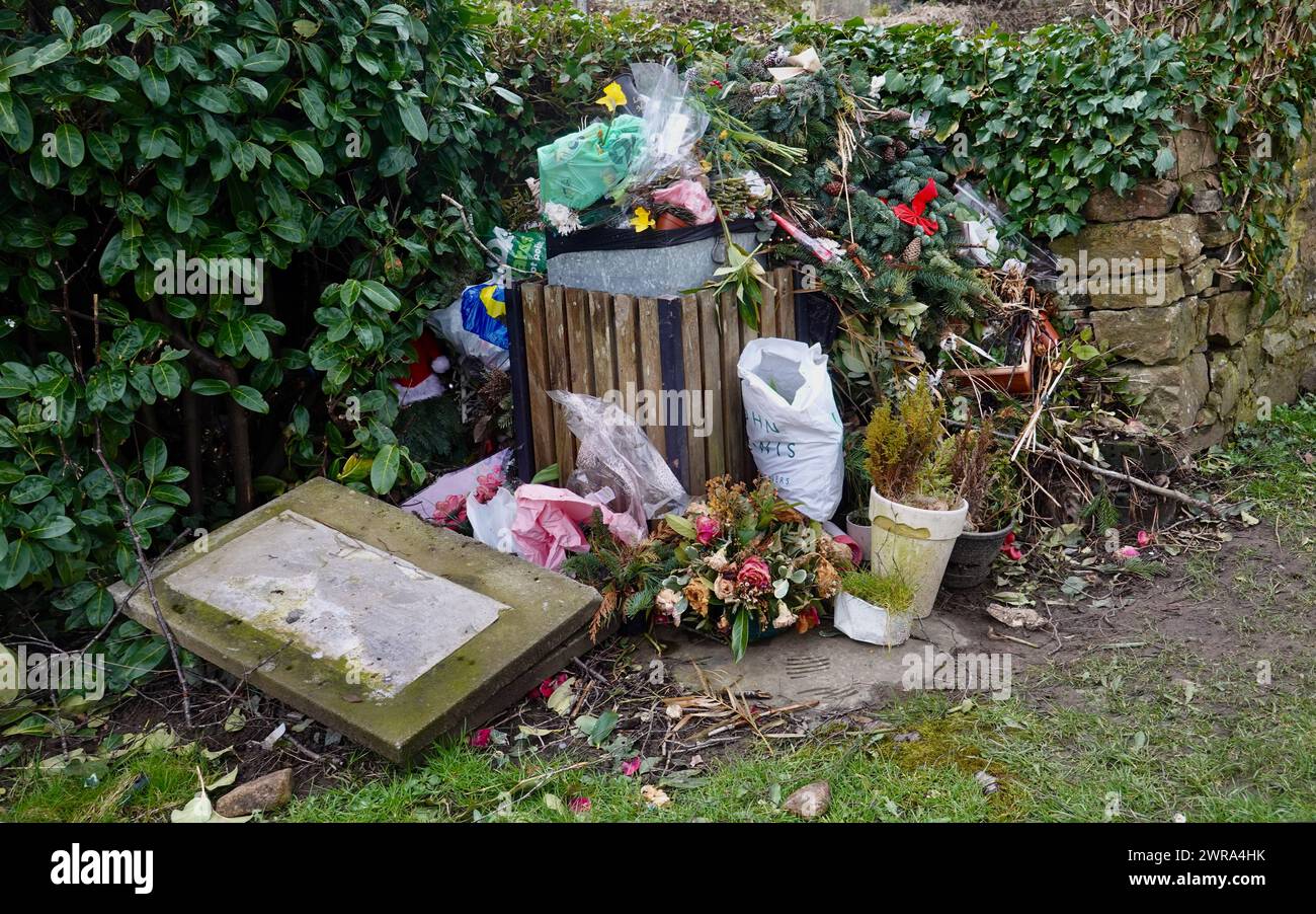 An overflowing waste bin in Thornsett Cemetery, High Peak, Derbyshire ...