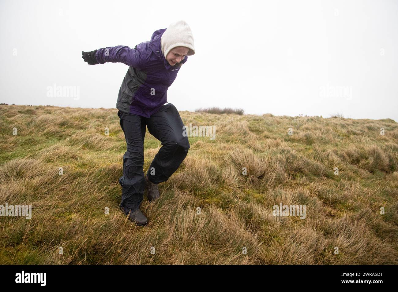 15/02/120 Freya Kirkpatrick, 12, plays in storm force winds high up on ...
