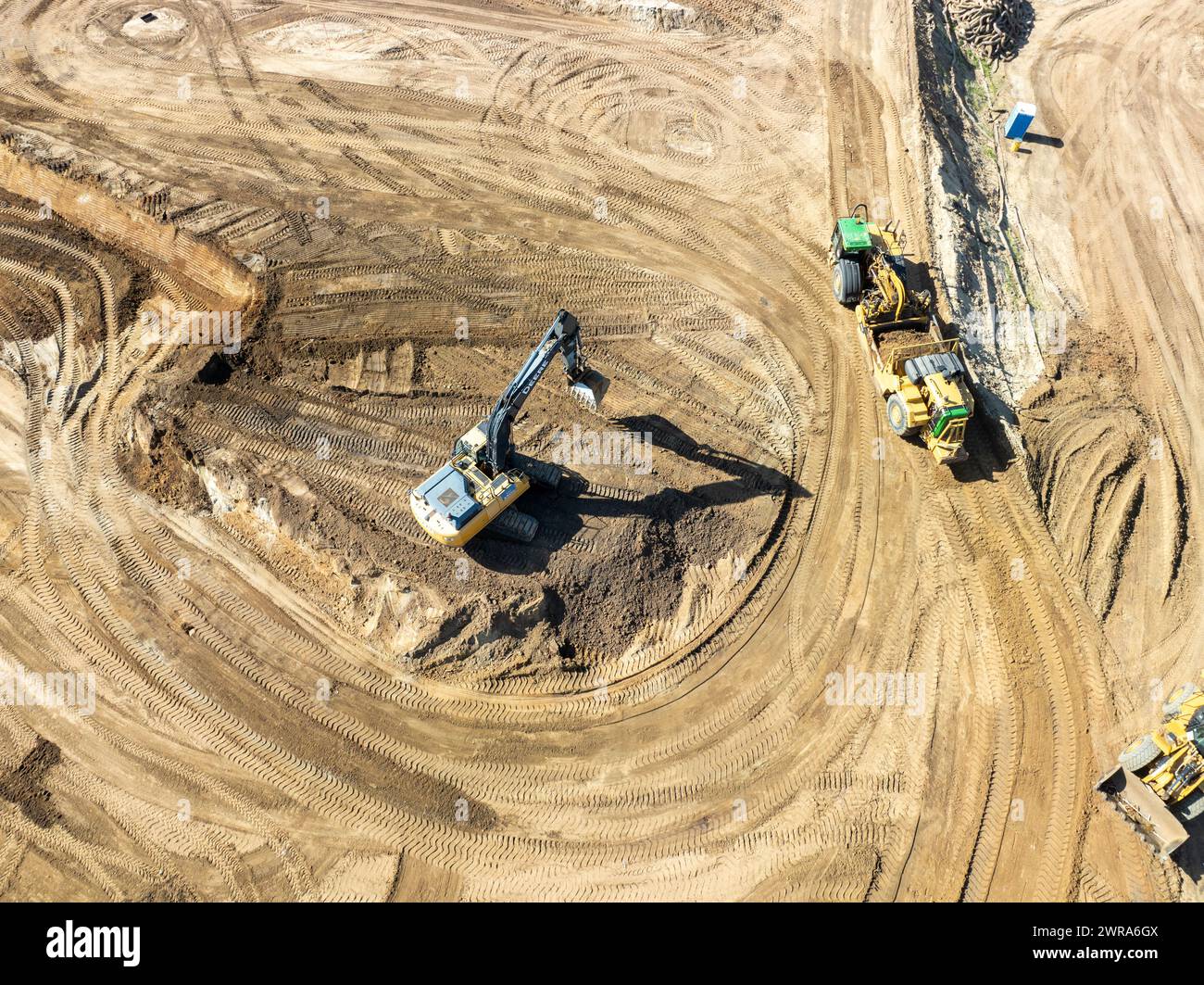 Aerial view of heavy construction equipment working at the construction ...