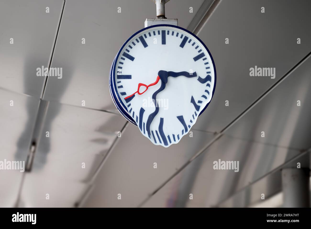 german train station clock, time is running Stock Photo - Alamy