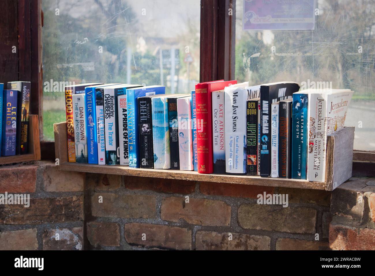 Bookshelf in a Community Lending Library in Graveley, Cambridgeshire ...