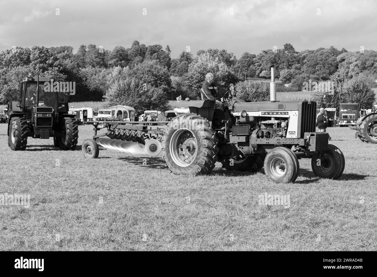 Red and white farmall tractor Black and White Stock Photos & Images - Alamy