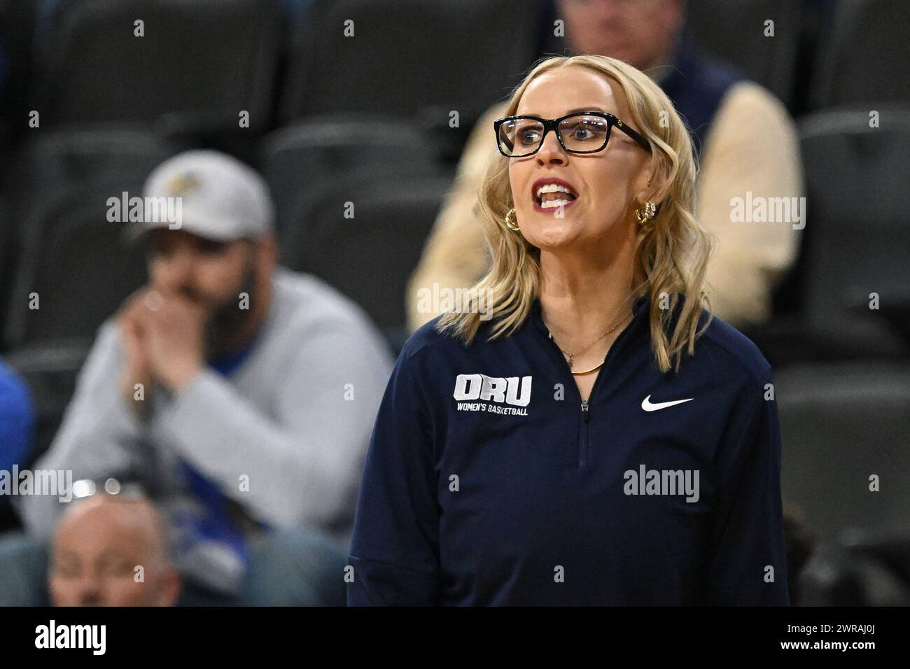 Oral Roberts Golden Eagles head coach Kelsi Musick yells to her players ...