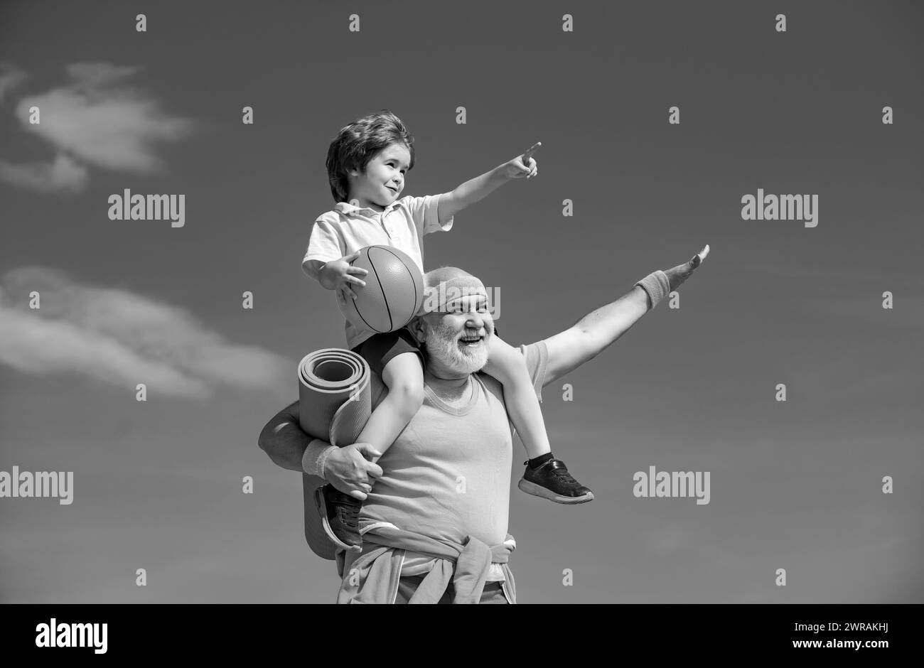 Father son doing exercise outdoor Black and White Stock Photos & Images ...