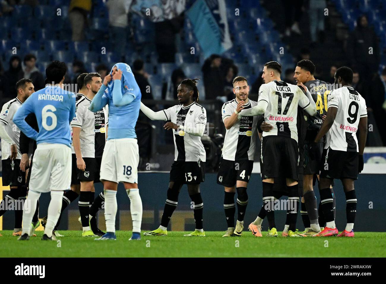 Rome, Italy. 11th Mar, 2024. Udinese players celebrate at the end of ...