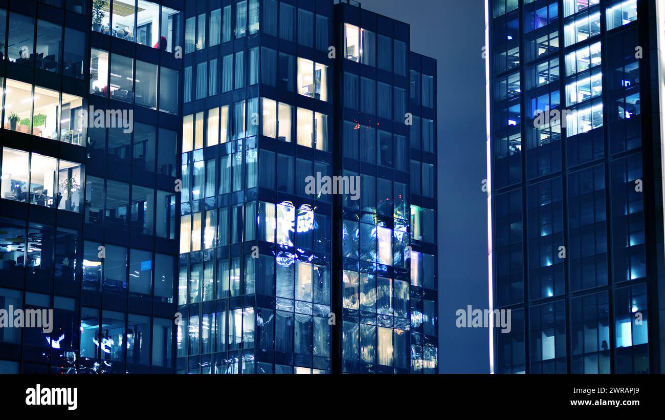 Office buildings by night. Night architectural, buildings with glass ...