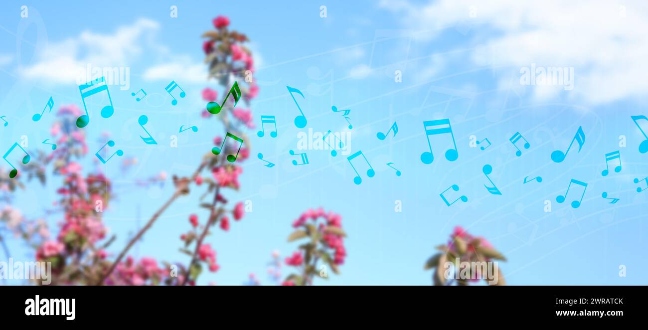 Flying music notes and blooming tree on spring day Stock Photo - Alamy